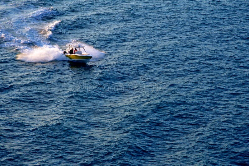Motor boat stock image. Image of blue, waves, people, ocean - 1995077
