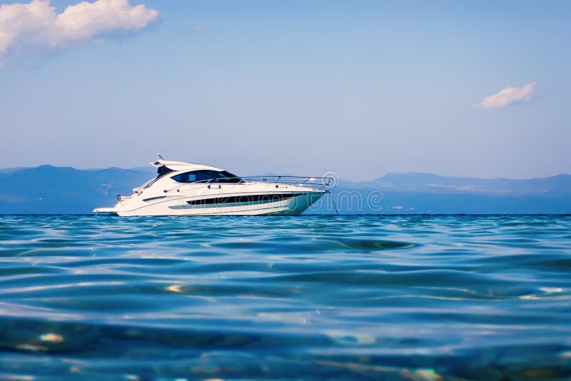 Motor Boat Floating on Clear Turquoise Water Stock Photo - Image of ...