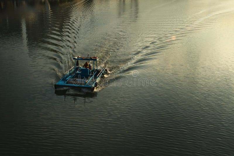 Motor Boat Moving on Water Creating Ripples and Waves. Stock Photo ...