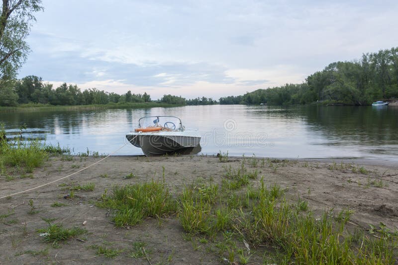 Motor Boat on the Riverside Stock Photo - Image of summer, shore: 241023886