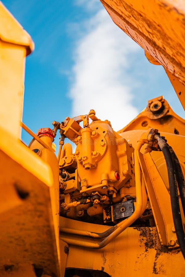 Motor Engine Part of an Yellow Heavy Machinery Excavator Stock Image ...