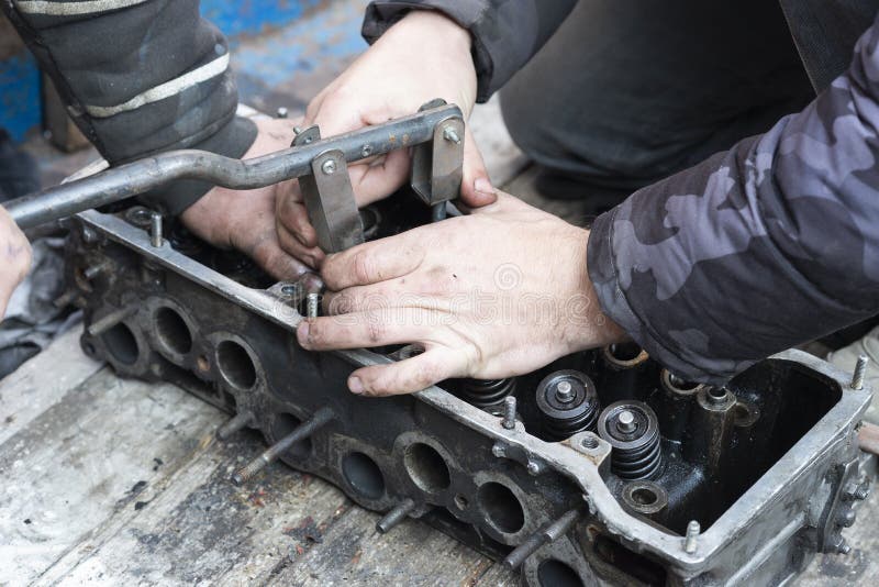 Motor fix by mechanic stock image. Image of garage, motor - 246201883