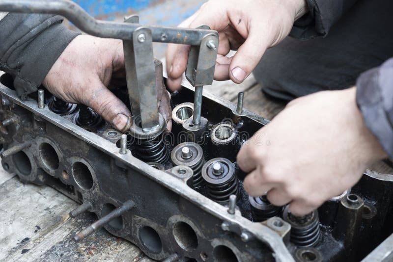 Motor fix by mechanic stock image. Image of automotive - 245451527