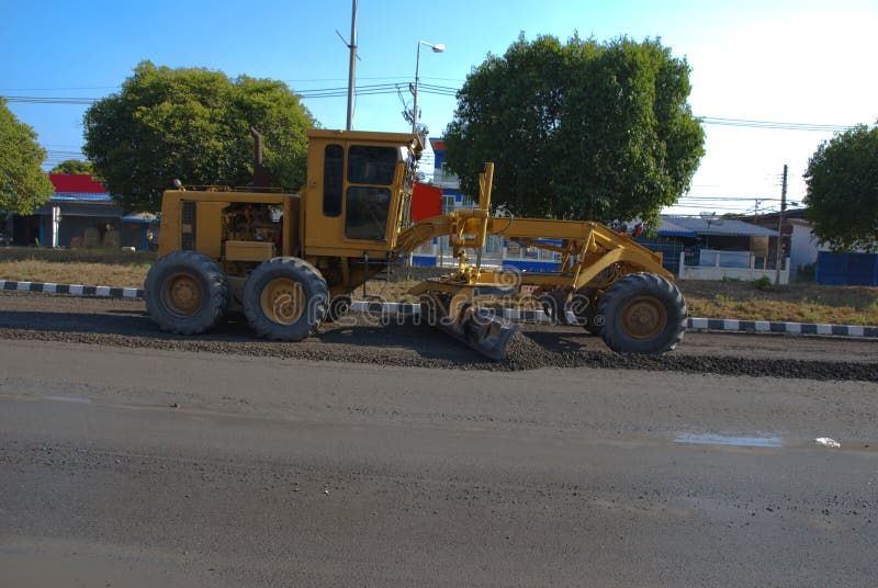 Motor grader is working stock photo. Image of land, industry - 88405412