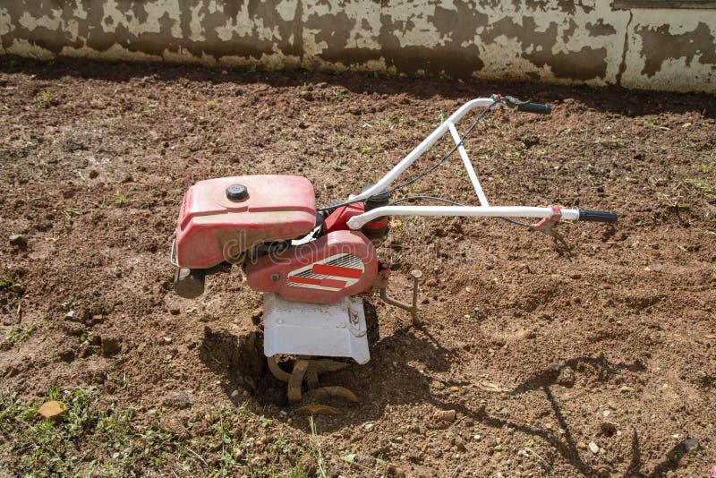 Motor Hoe after the Field with Shovels Buried in the Ground Stock Image ...