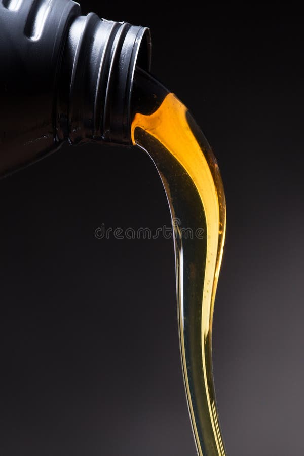 Motor oil pouring stock photo. Image of pour, lubrication - 47429160