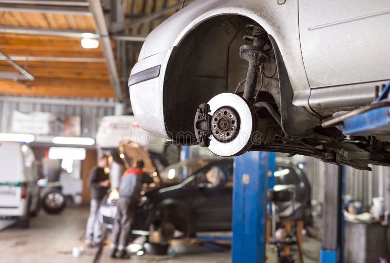 Motor Oil Pouring To Car Engine. a Service Station. Stock Photo - Image ...