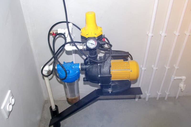 Motor for a Water Pump in a Pump Room Against a White Wall Stock Image ...