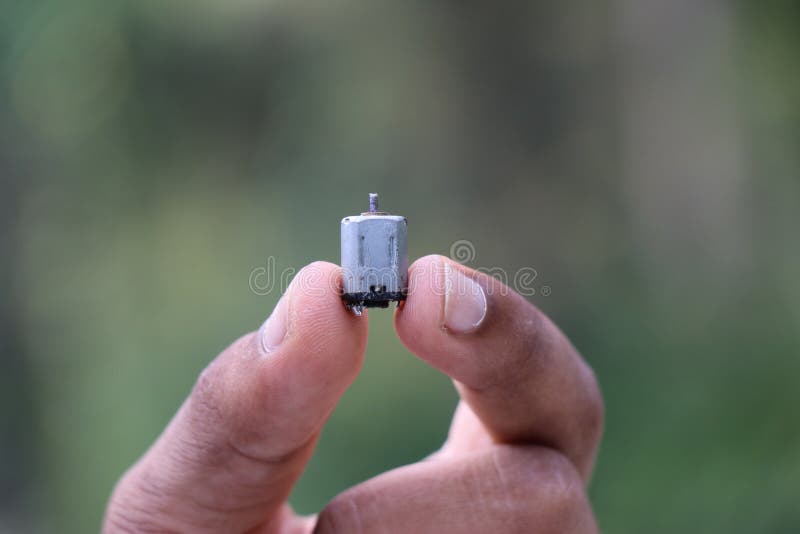 Motor Which is Used in Micro Servo Held in Hand Stock Photo - Image of ...
