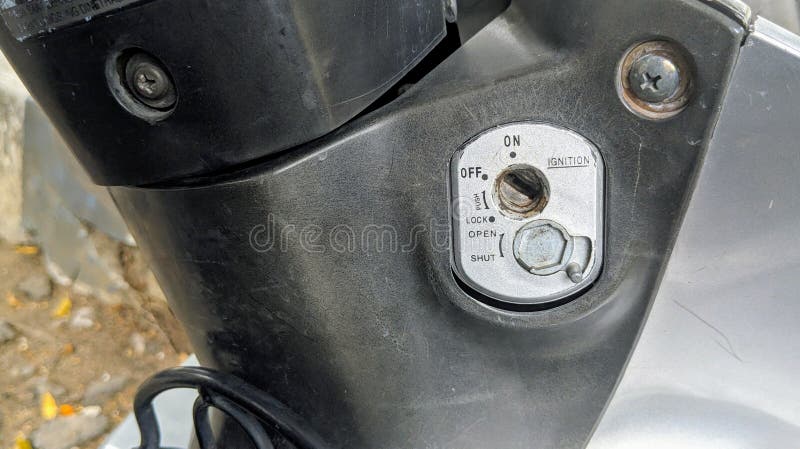 The Motorbike Starter Key is Installed in the Motorbike Ignition Hole ...
