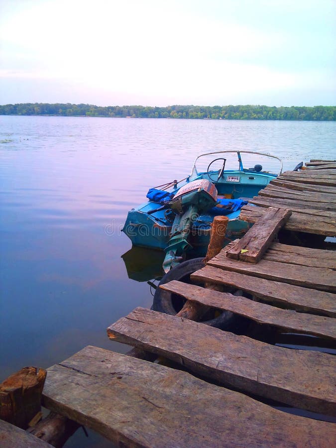 Motorboat Near the Pier on the River. Editorial Stock Photo - Image of ...