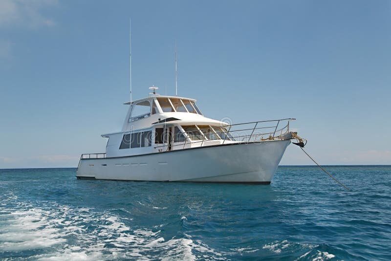 Motorboat on water stock photo. Image of blue, beautiful - 115084660