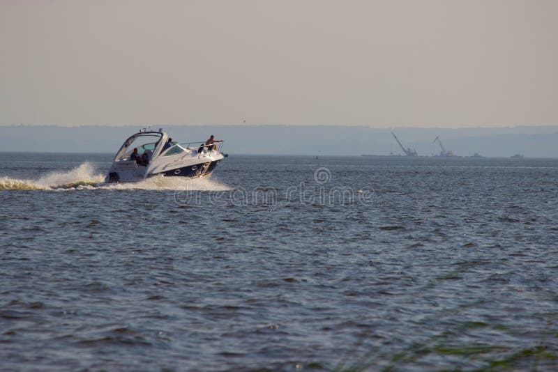 Motorboat with Waves on the River Editorial Photo - Image of guard ...