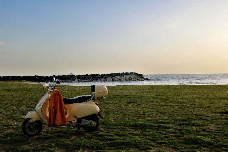 Motorcycle at the beach stock photo. Image of blue, pier - 2514328