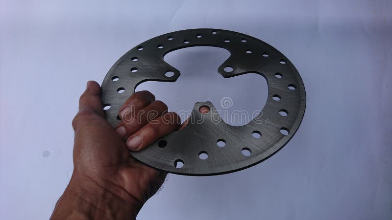 Motorcycle Brake Disc in Hand Grip Stock Photo - Image of metal ...