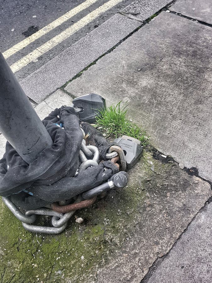Motorcycle Chains and Locks on a Lamp Post Editorial Stock Photo ...