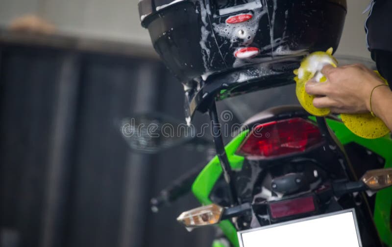 Motorcycle Clean Service. Employees are Washing Motorbikes. Stock Photo ...