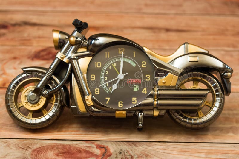 Motorcycle clock on table stock image. Image of retro - 72601041