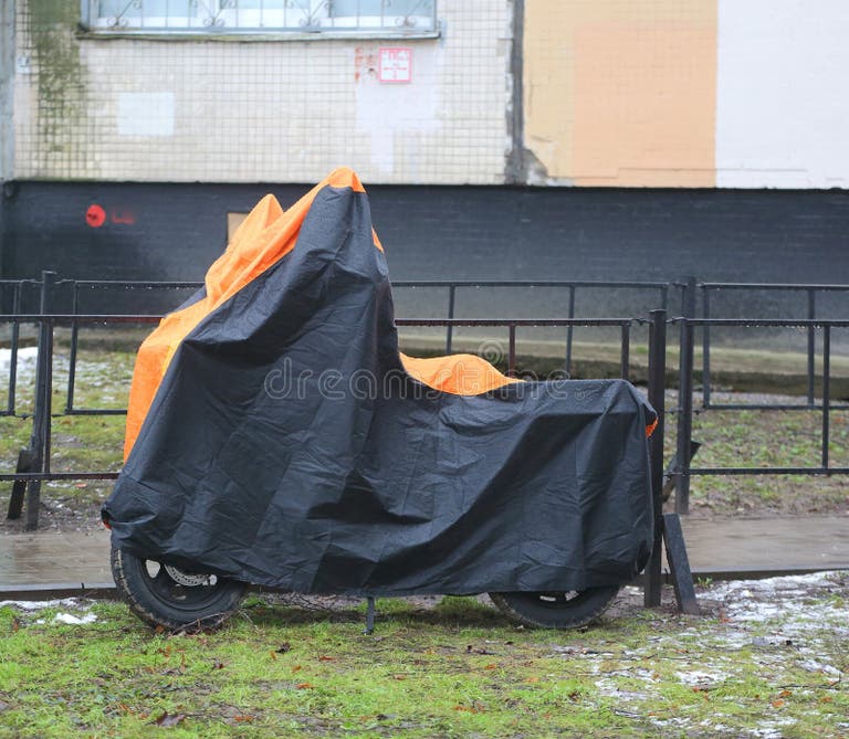 Motorcycle Covered with a Cover Stock Photo - Image of isolated, city ...