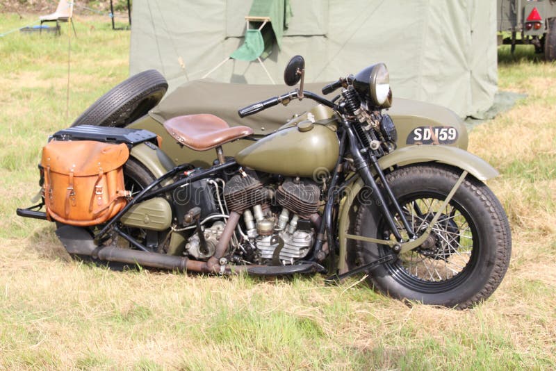 World War 2 Despatch Rider in Uniform on Classic Motorcycle Riding Past ...