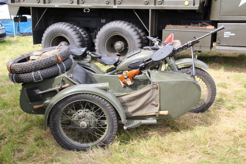 World War 2 Despatch Rider in Uniform on Classic Motorcycle Riding Past ...