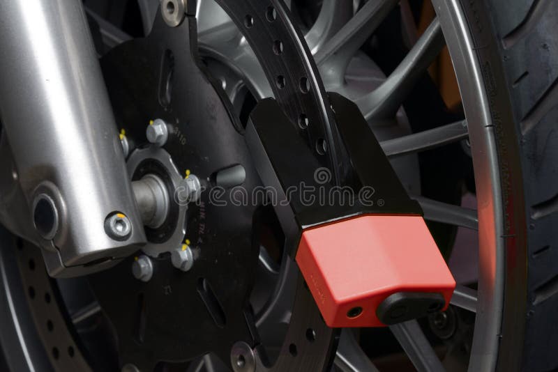 Motorcycle disc lock stock photo. Image of stealing, prevent - 64235370