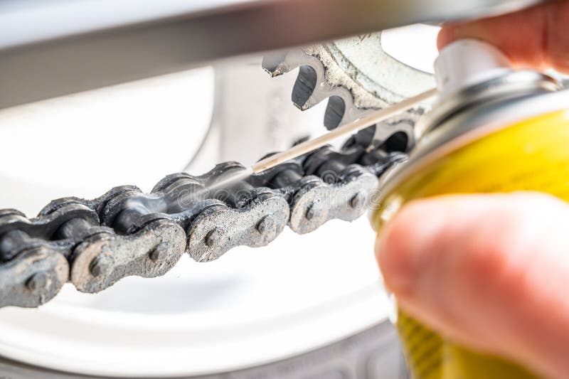 Motorcycle Drive Chain and Lubricant. Stock Photo - Image of ...