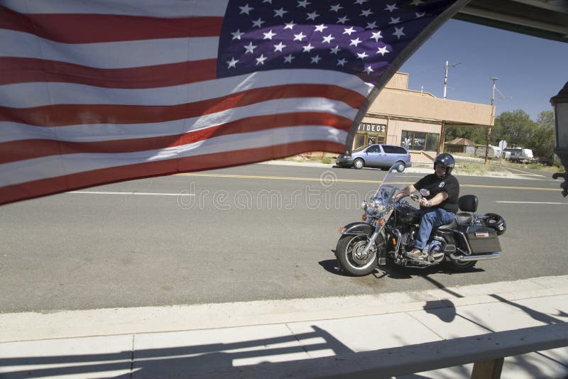 Motorcycle driver editorial stock photo. Image of town - 27076438