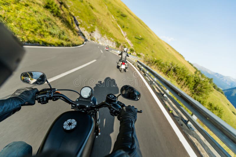 Motorcycle Driver Riding in Alpine Highway, Handlebars View, Austria ...