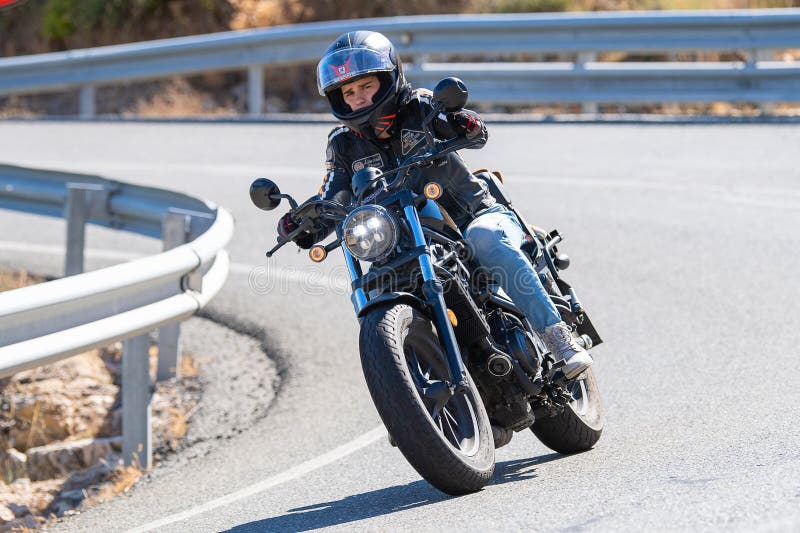 Motorcycle Driver Taking a Curve Editorial Photo - Image of adventure ...
