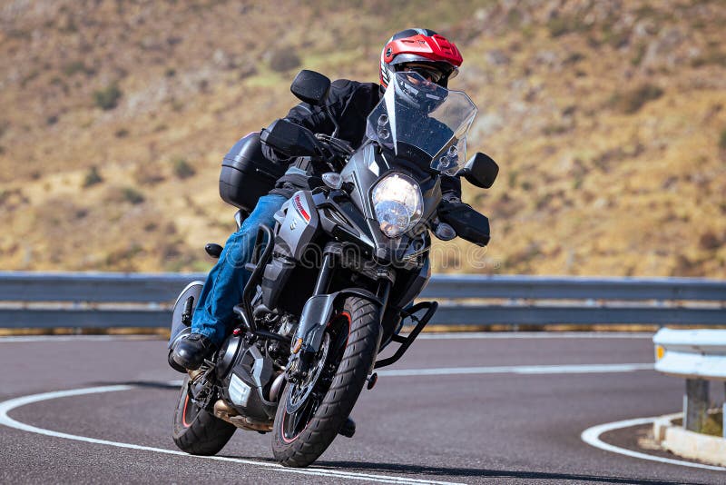 Motorcycle Driver Taking a Curve Editorial Photo - Image of nature ...
