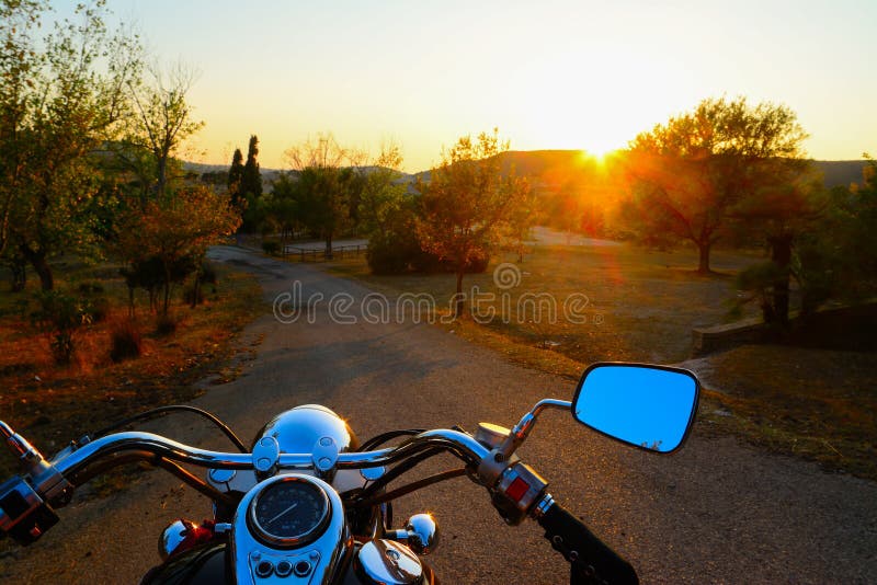 Motorcycle on the Edge of the Road at Sunset Stock Photo - Image of ...