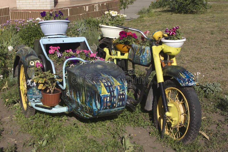 Old Motorcycle with Flowers Stock Photo - Image of rock, antique: 34837020
