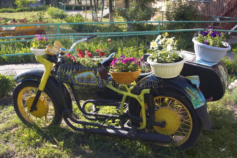 Motorcycle with flowers stock photo. Image of vintage - 117728422