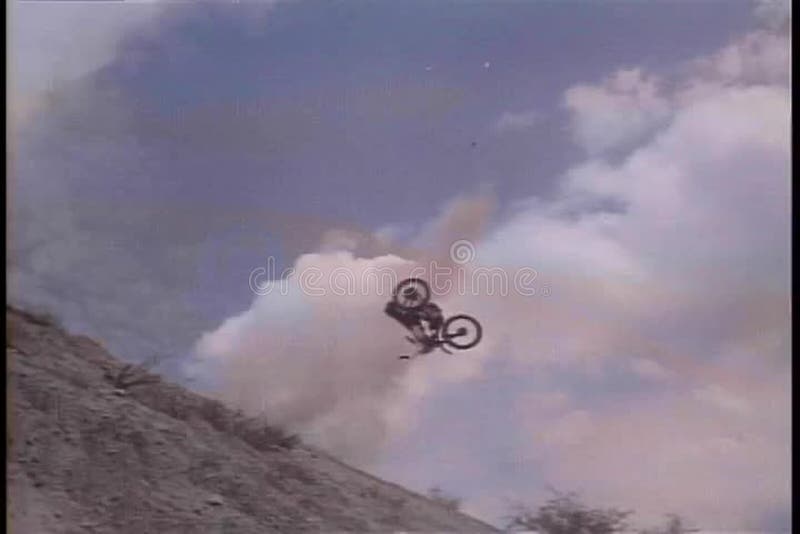 Motorcycle Flying Off Road Followed by Biker Stock Footage - Video of ...