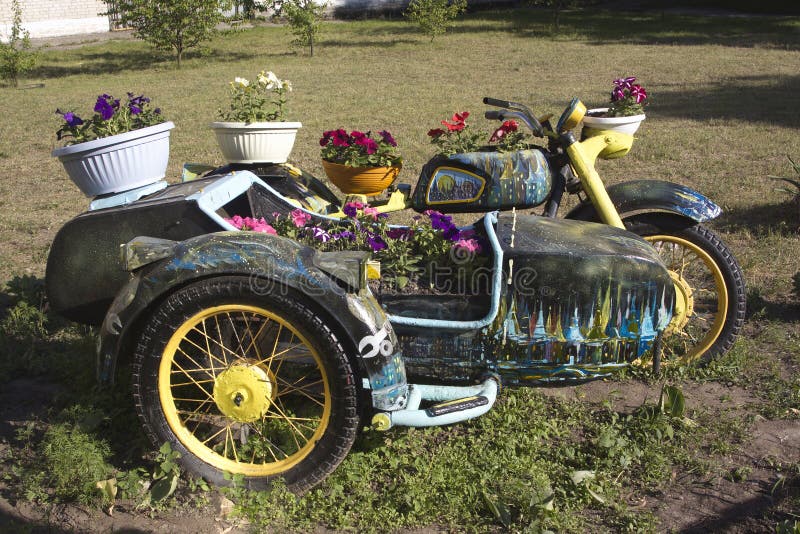 Motorcycle with flowers stock photo. Image of vintage - 117728422