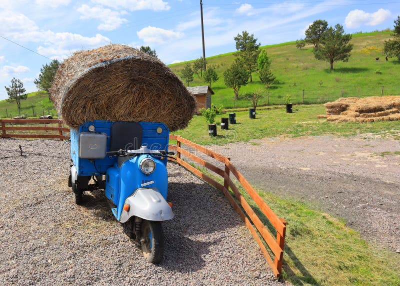 Motorcycle with Hay on a Farm in a Sunny Day Stock Photo - Image of ...