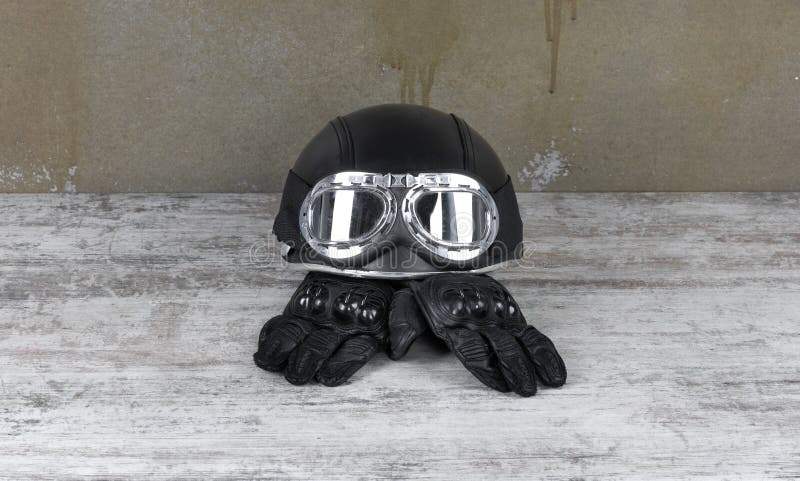 Motorcycle Helmet and Biker Gloves on Table Stock Photo - Image of ...