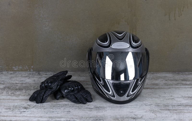 Motorcycle Helmet and Biker Gloves on Table Stock Photo - Image of ...