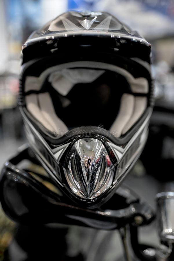 Chrome Helmet Reflects Adventure in Futuristic Motorcycle Racing ...