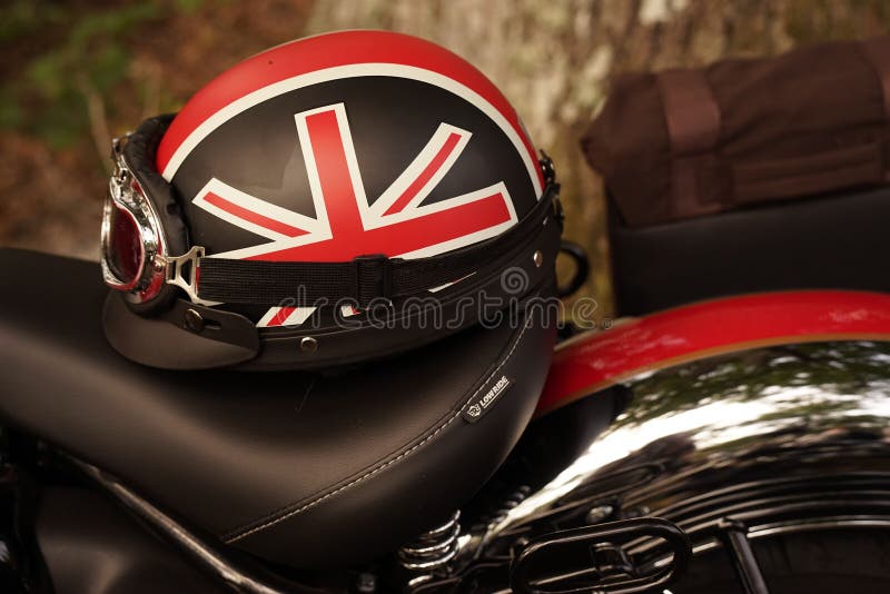 Motorcycle with a Helmet Featuring a British Flag Design Editorial ...