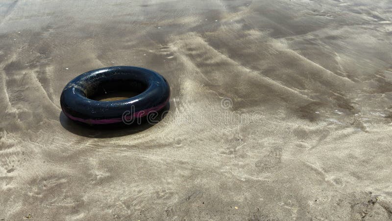 Motorcycle Inner Tubes are Used As Floats when Swimming at the Beach ...