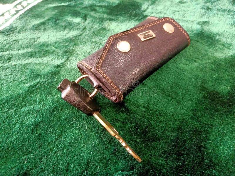 Motorcycle Key and Keychain in the Form of a Black Leather Wallet Stock ...