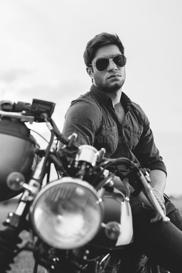 Motorcycle Man stock image. Image of adult, cool, garage - 95573137