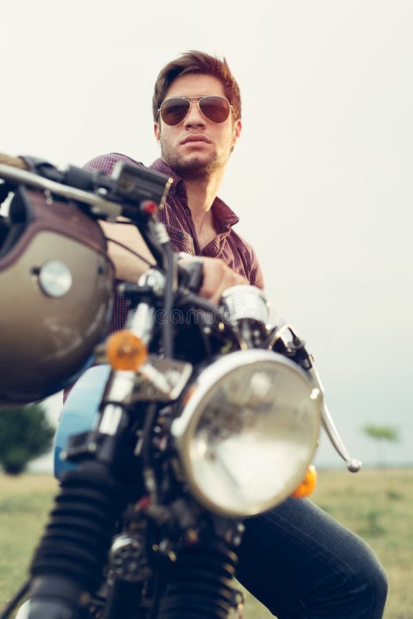 Motorcycle Man stock image. Image of male, looking, crossed - 95573285