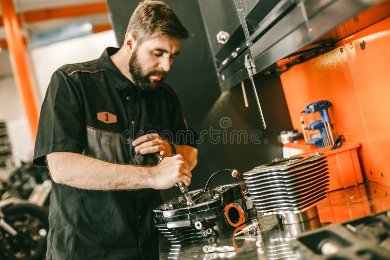 Motorcycle Mechanic Engine Repair at Service Station Stock Image ...