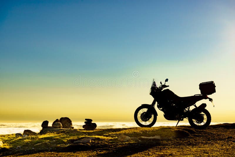 Motorcycle on mountain top stock photo. Image of ride - 377374934