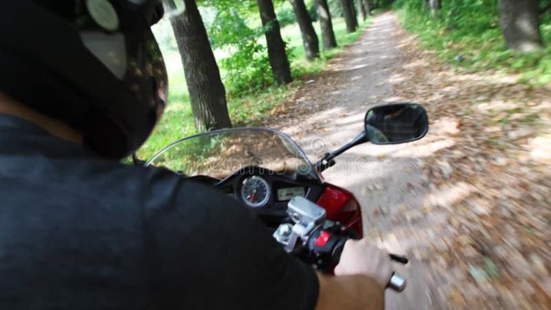 Motorcycle Moving on Road in Park. Shooting from Stock Video - Video of ...