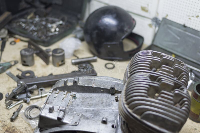 Motorcycle Parts and Tools on the Desktop in Garage Stock Image - Image ...