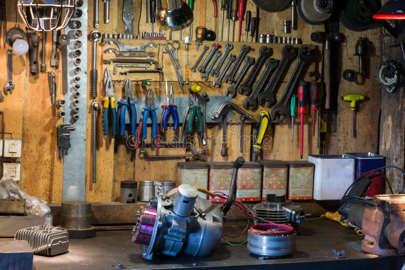 Motorcycle Parts and Tools on the Desktop in Garage Stock Photo - Image ...